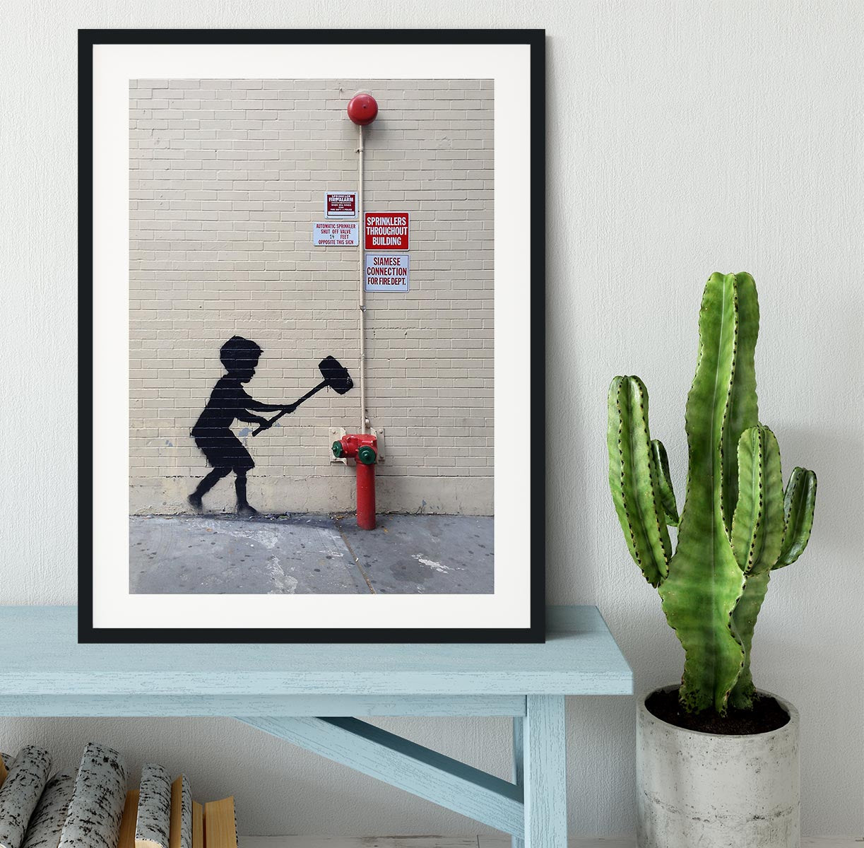Banksy Hammer Boy Framed Print | Canvas Art Rocks